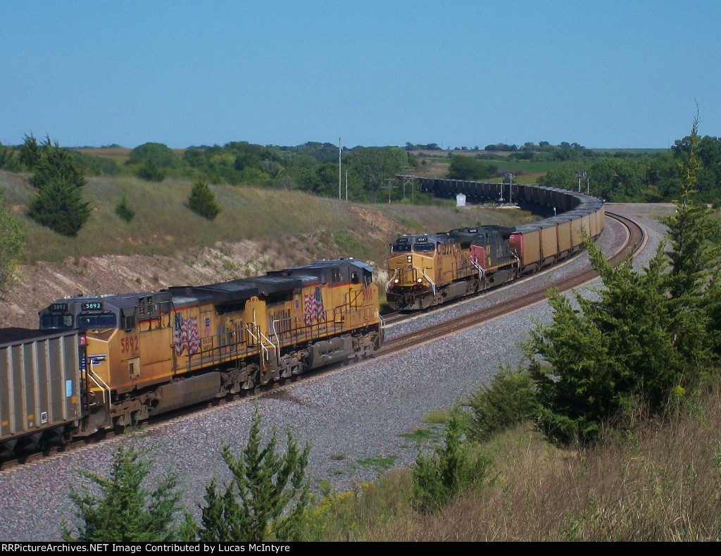 UP 5918 eastbound UP loaded coal train meeting UP 6547 with a westbound UP empty coal train